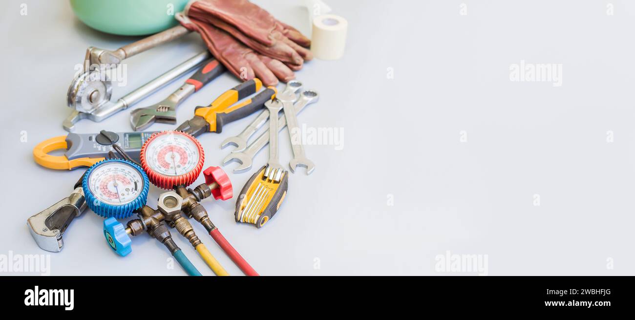 Tools for air conditioning repair and maintenance Stock Photo - Alamy