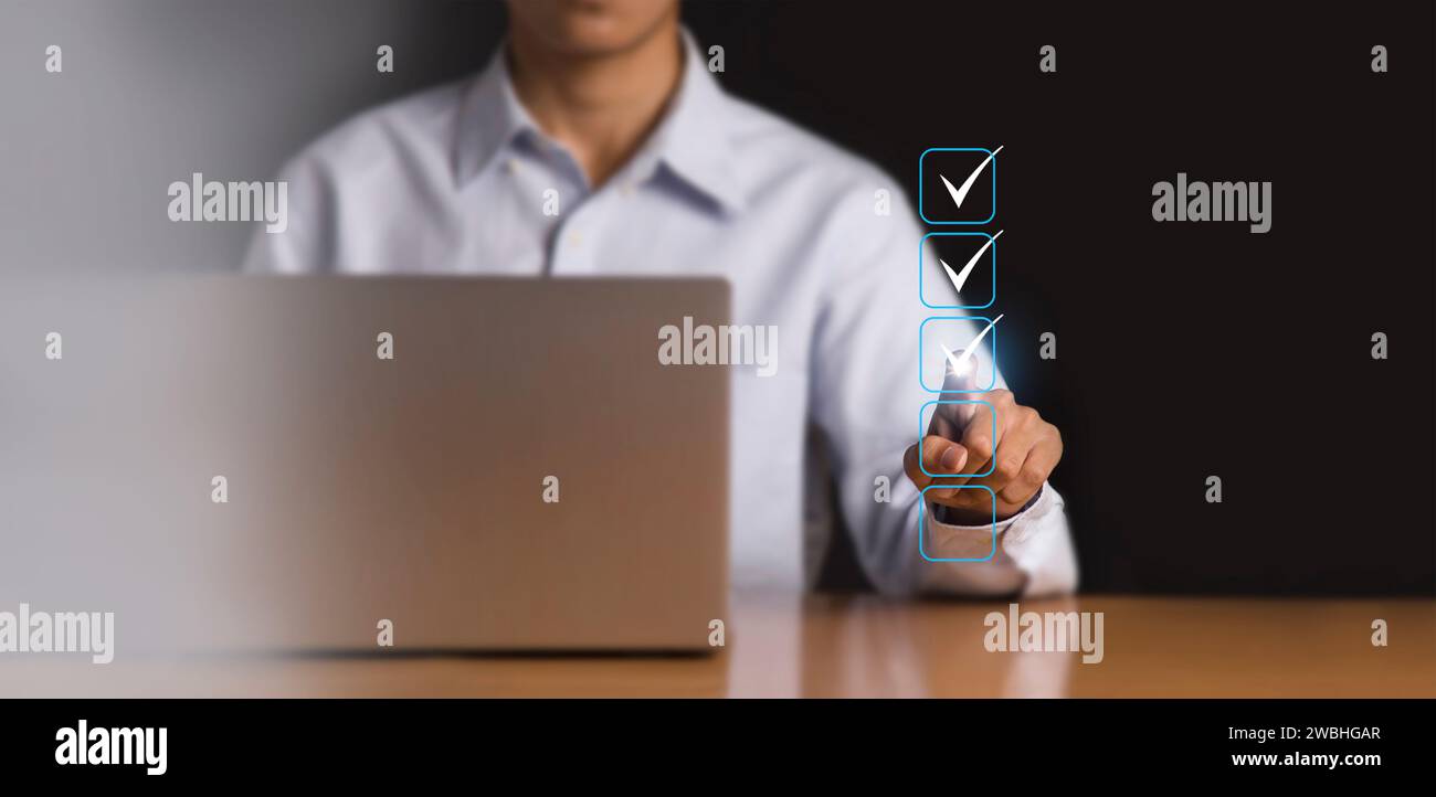 Businessman making correct marks, marks for checklist, document quality ...