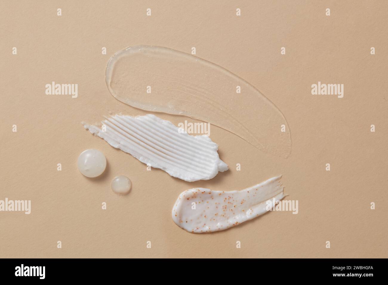 Top view of different cosmetic textures of transparent gel, scrubs ...