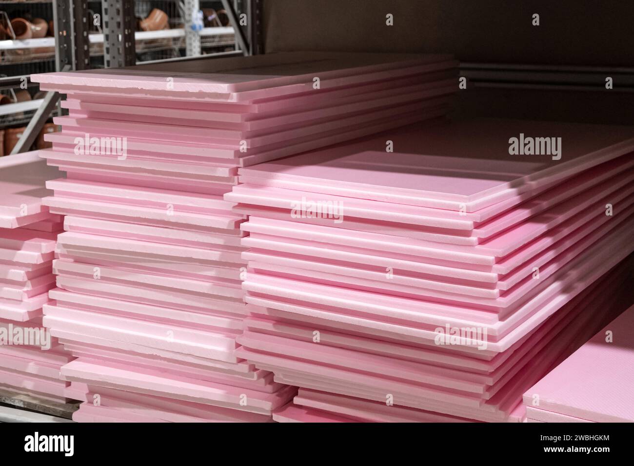Pink Extruded Polystyrene foam thermal insulation boards stacked in the ...
