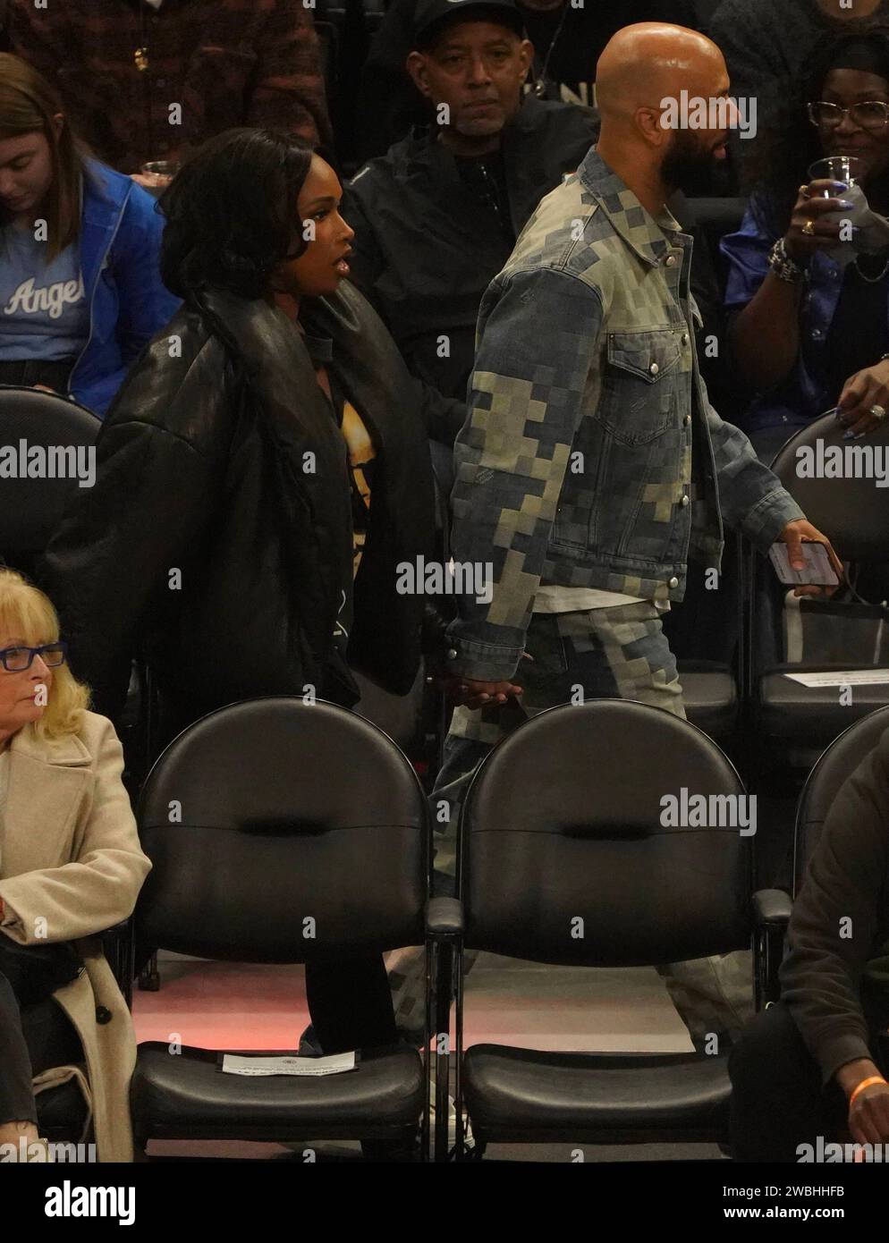 Jennifer Hudson and Common attend the game between the Toronto Raptors ...