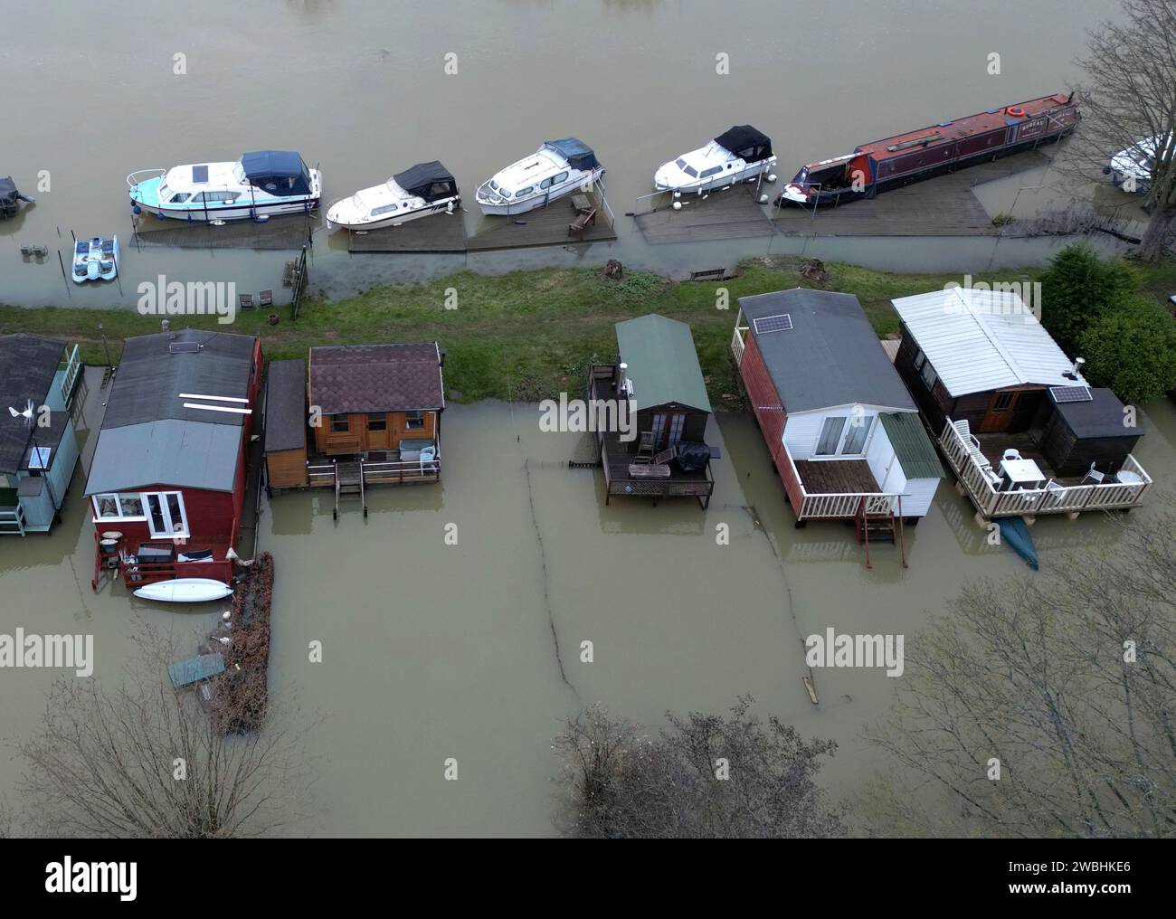 Flooding is still a problem as it surrounds these boat owners chalets ...