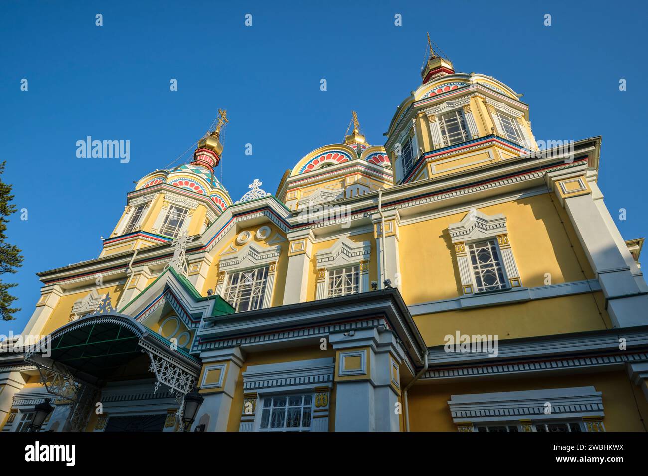 Detail view of the yellow side facade in morning, sunny, bright light ...