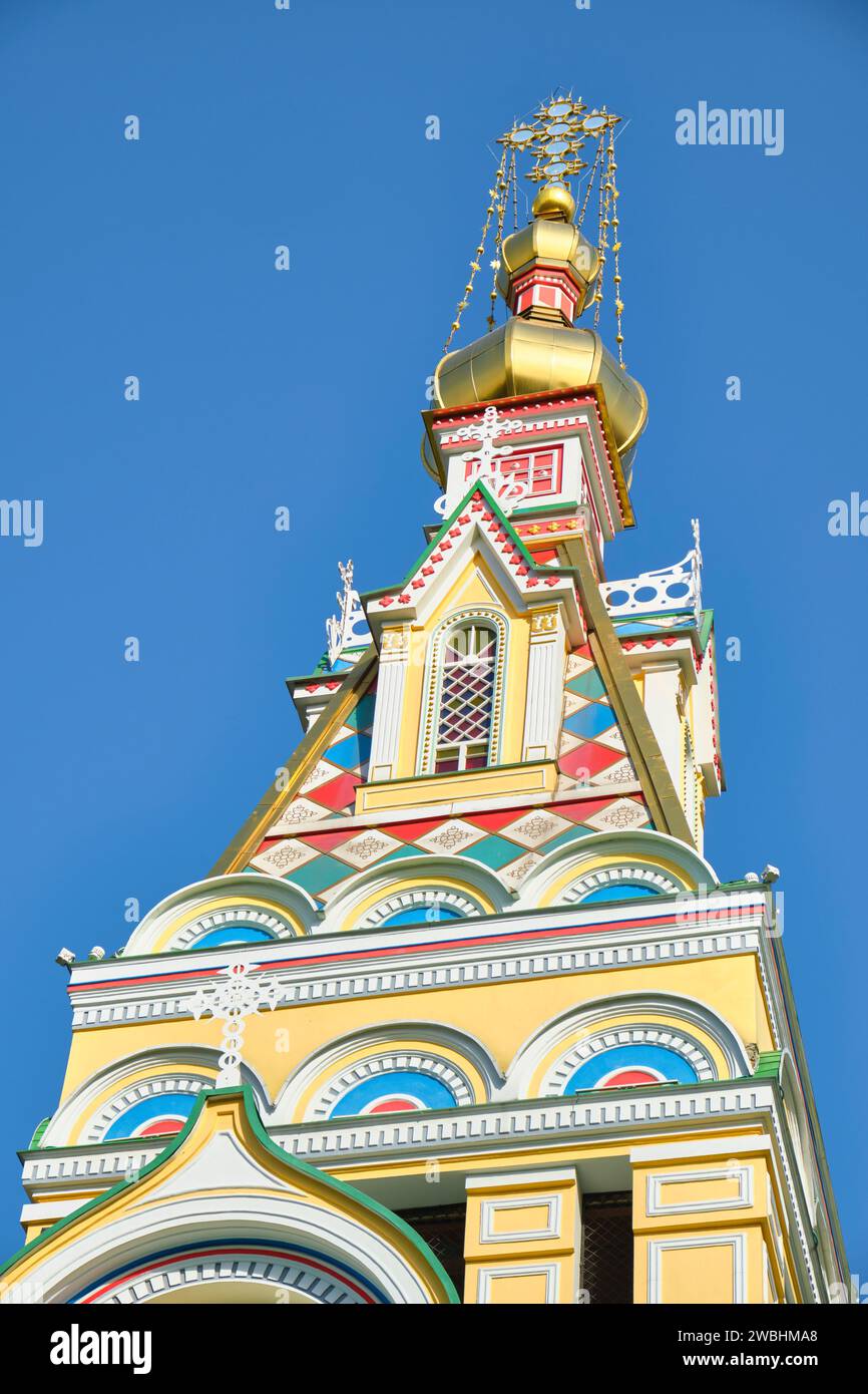 Detailed view of the yellow facade steeple in morning, sunny, bright ...