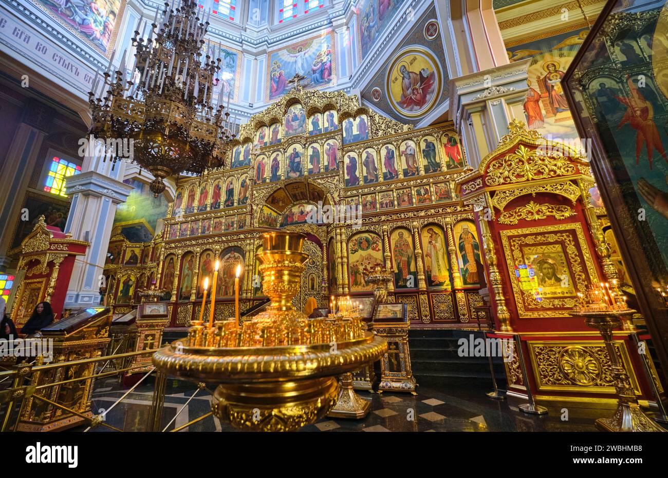 Interior view of the richly gold painted altar and various icon ...