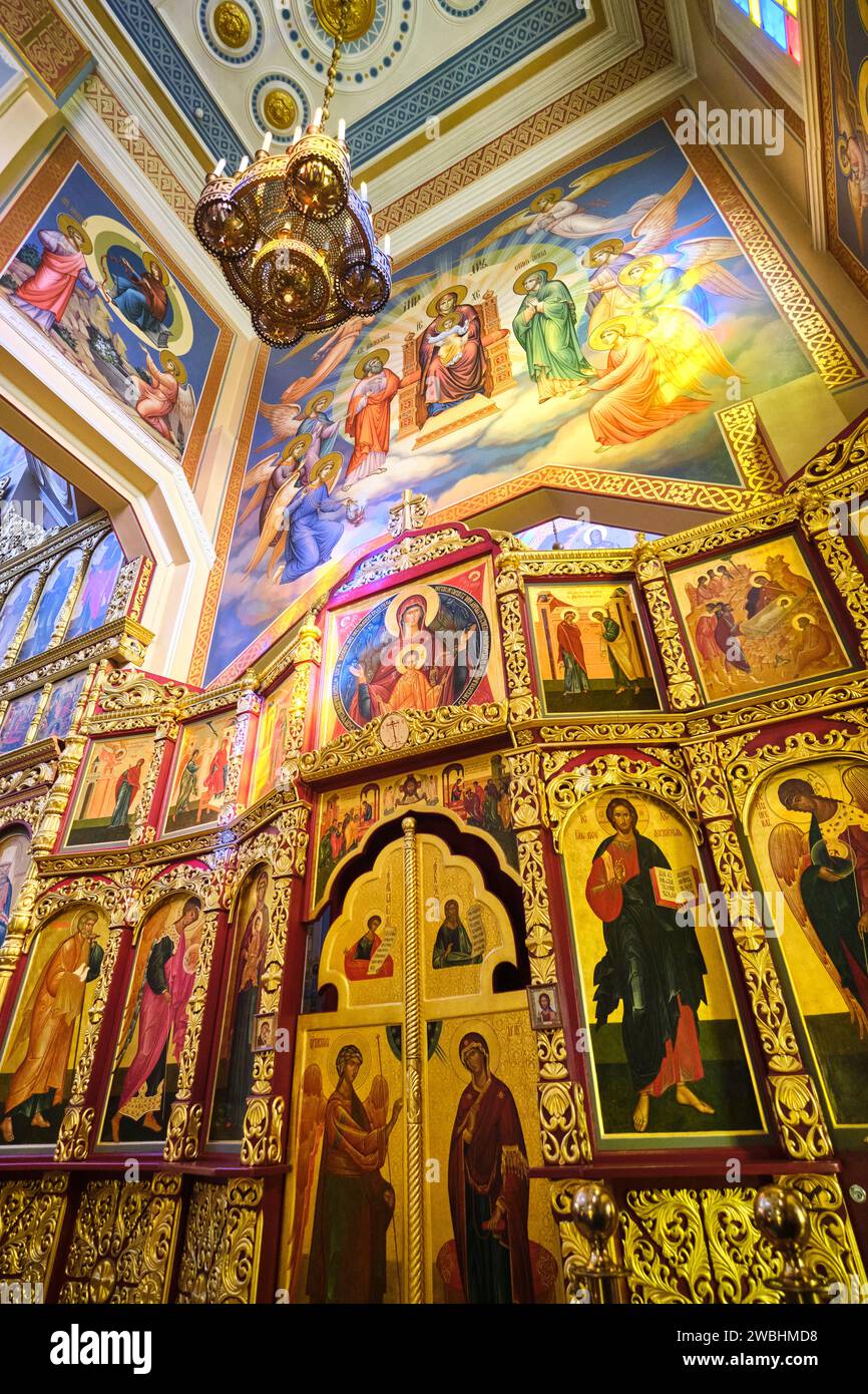 Interior view of the richly gold painted altar and various icon ...