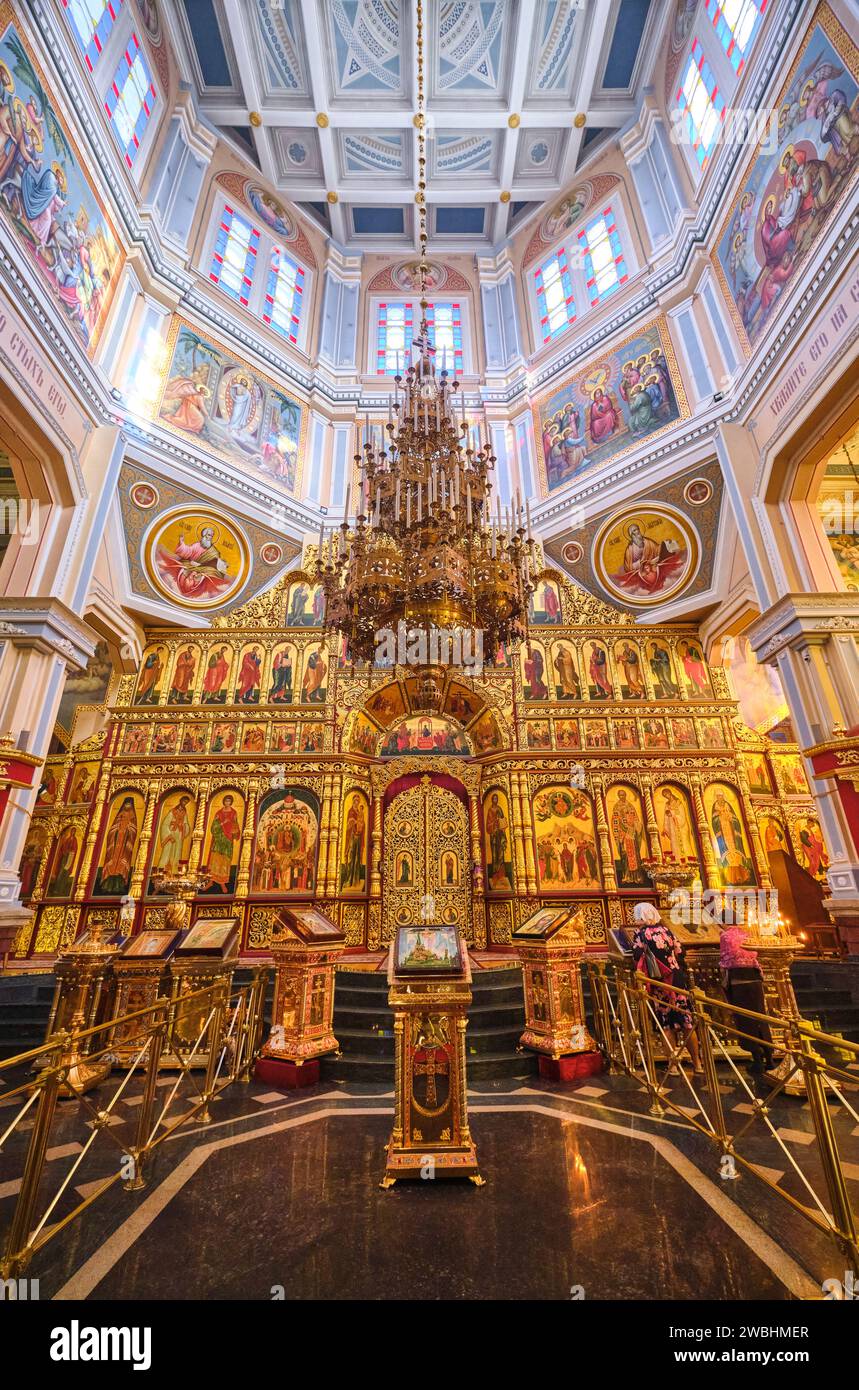 Interior view of the richly gold painted altar and various icon ...