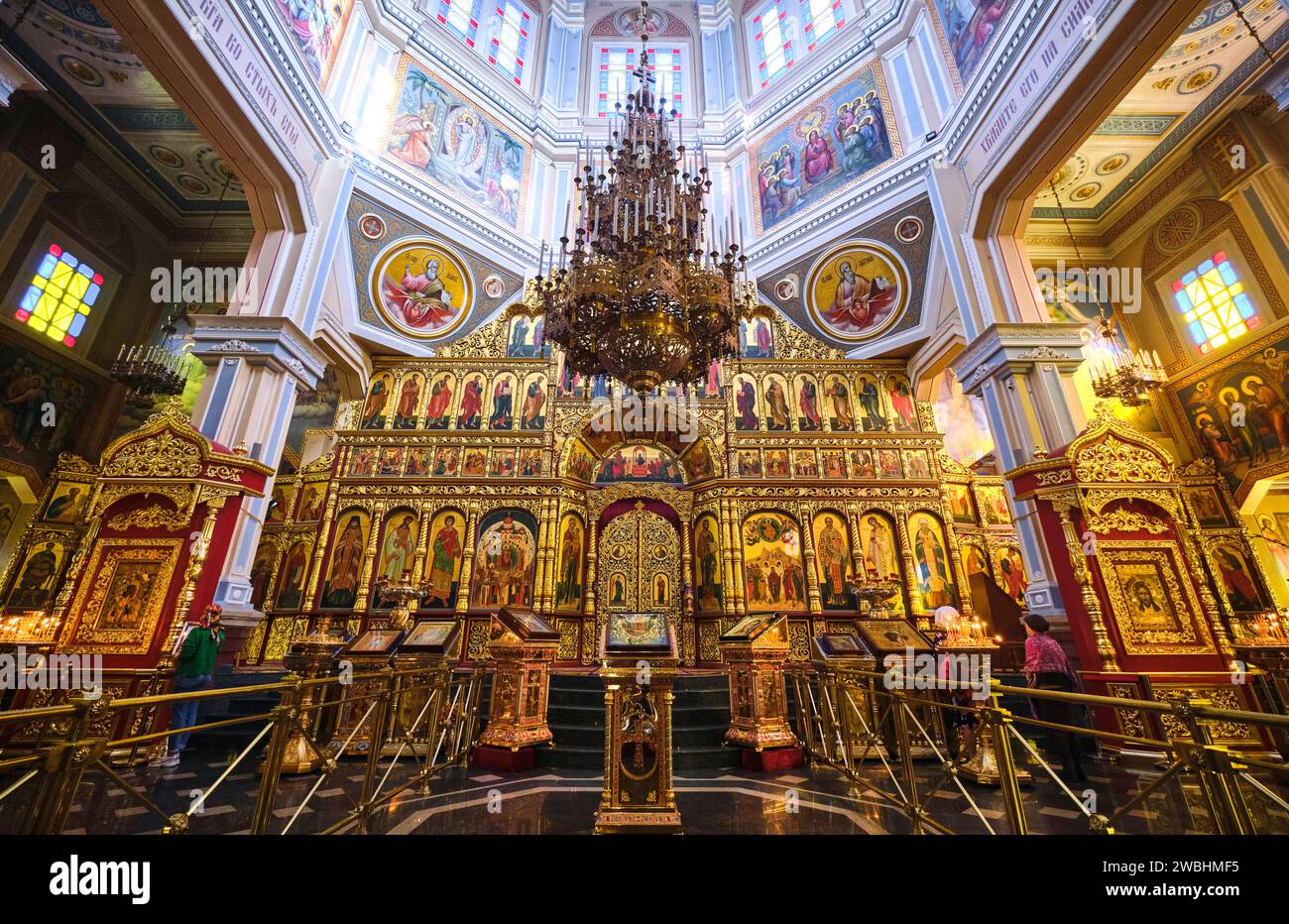 Interior view of the richly gold painted altar and various icon ...