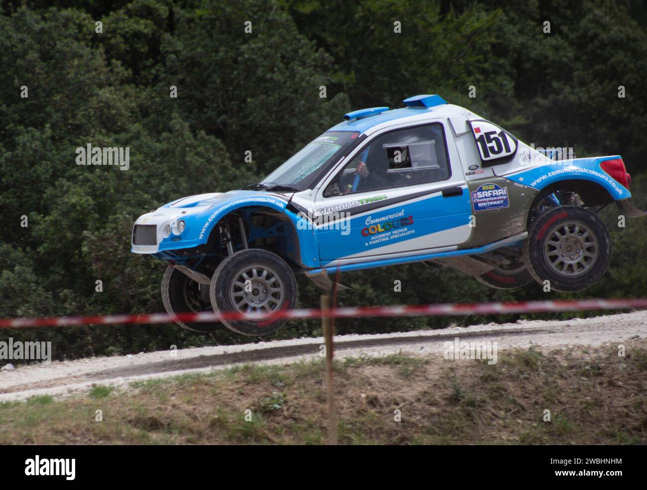 Extreme off road vehicles racing around off road track Goodwood ...