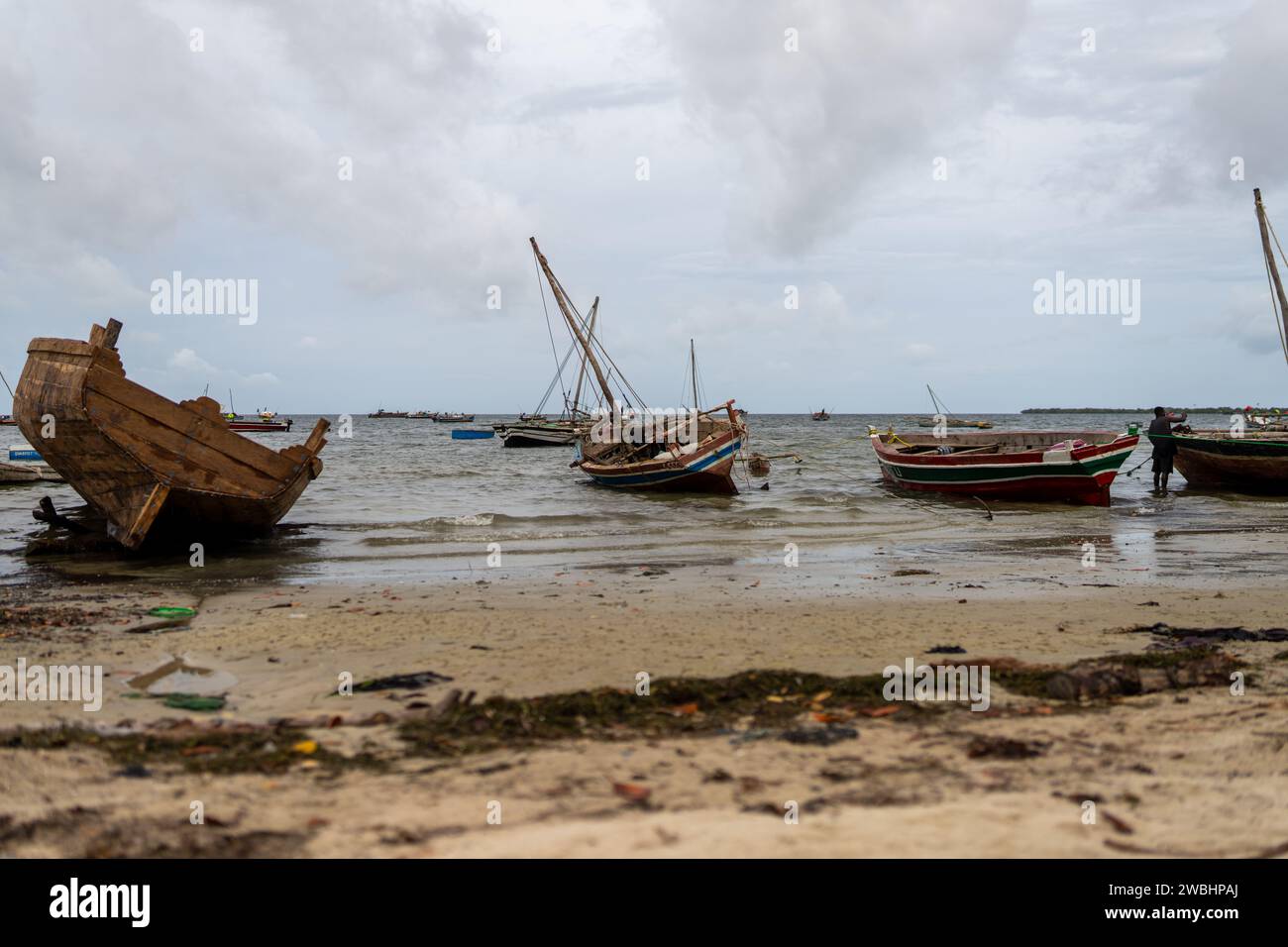 A beach with boats in Mocimboa da Praia in Cabo Delgado Province ...