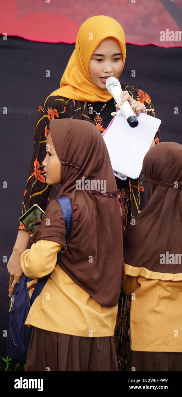 Some student play game with a beautiful teacher Stock Photo - Alamy