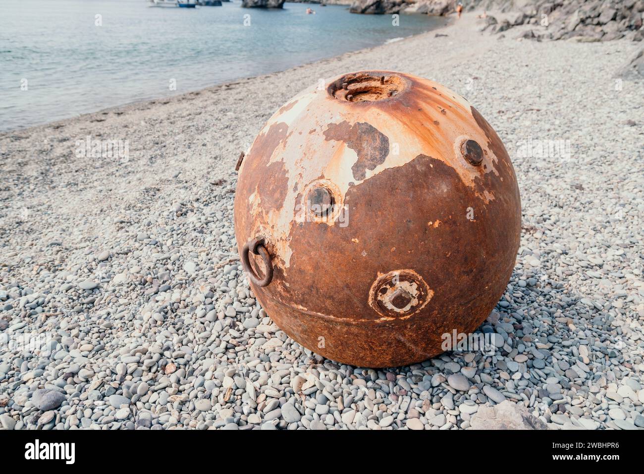 Old rusty sea mine on the beach Stock Photo - Alamy