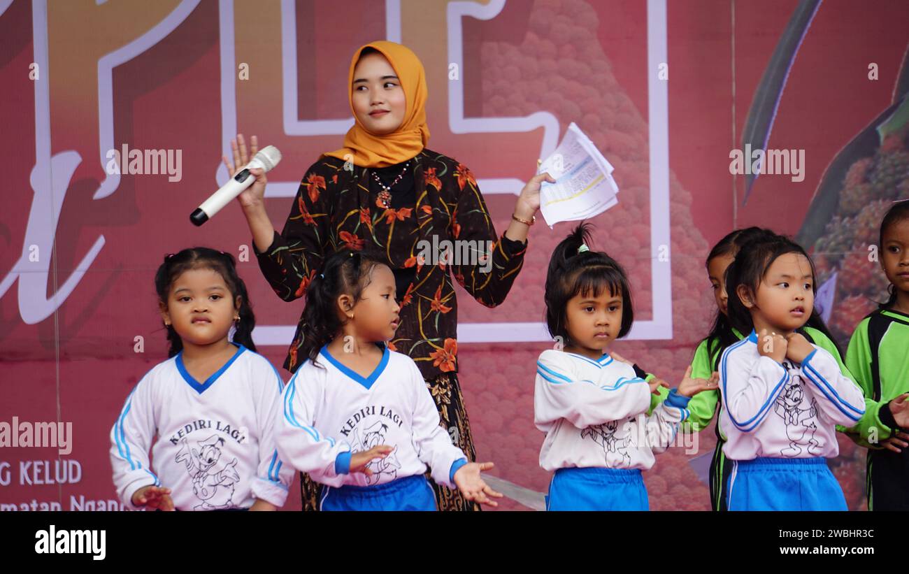 Some student play game with a beautiful teacher Stock Photo - Alamy