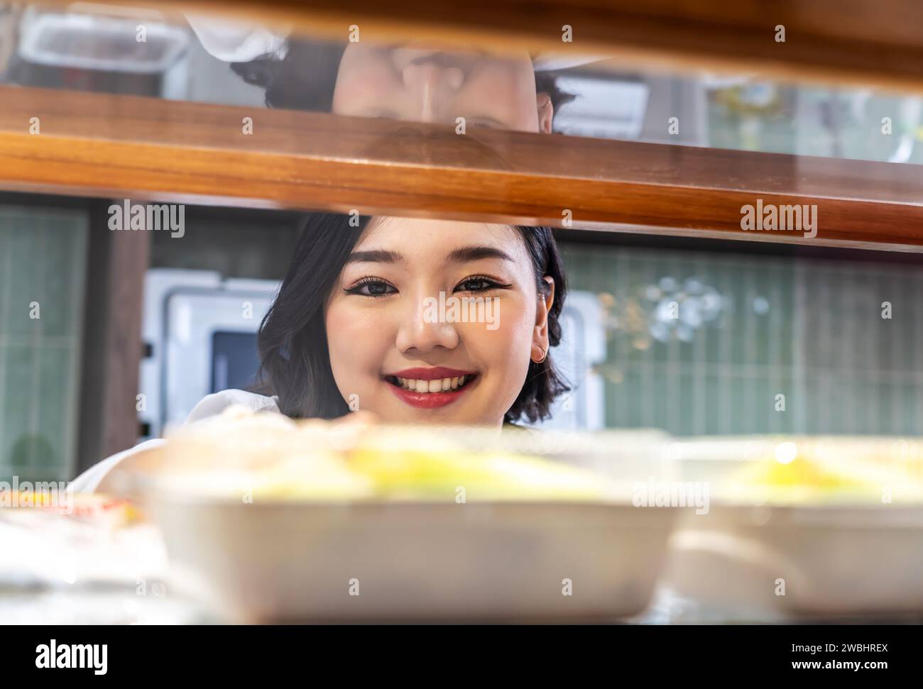 Supermarket shelf worker hi-res stock photography and images - Alamy