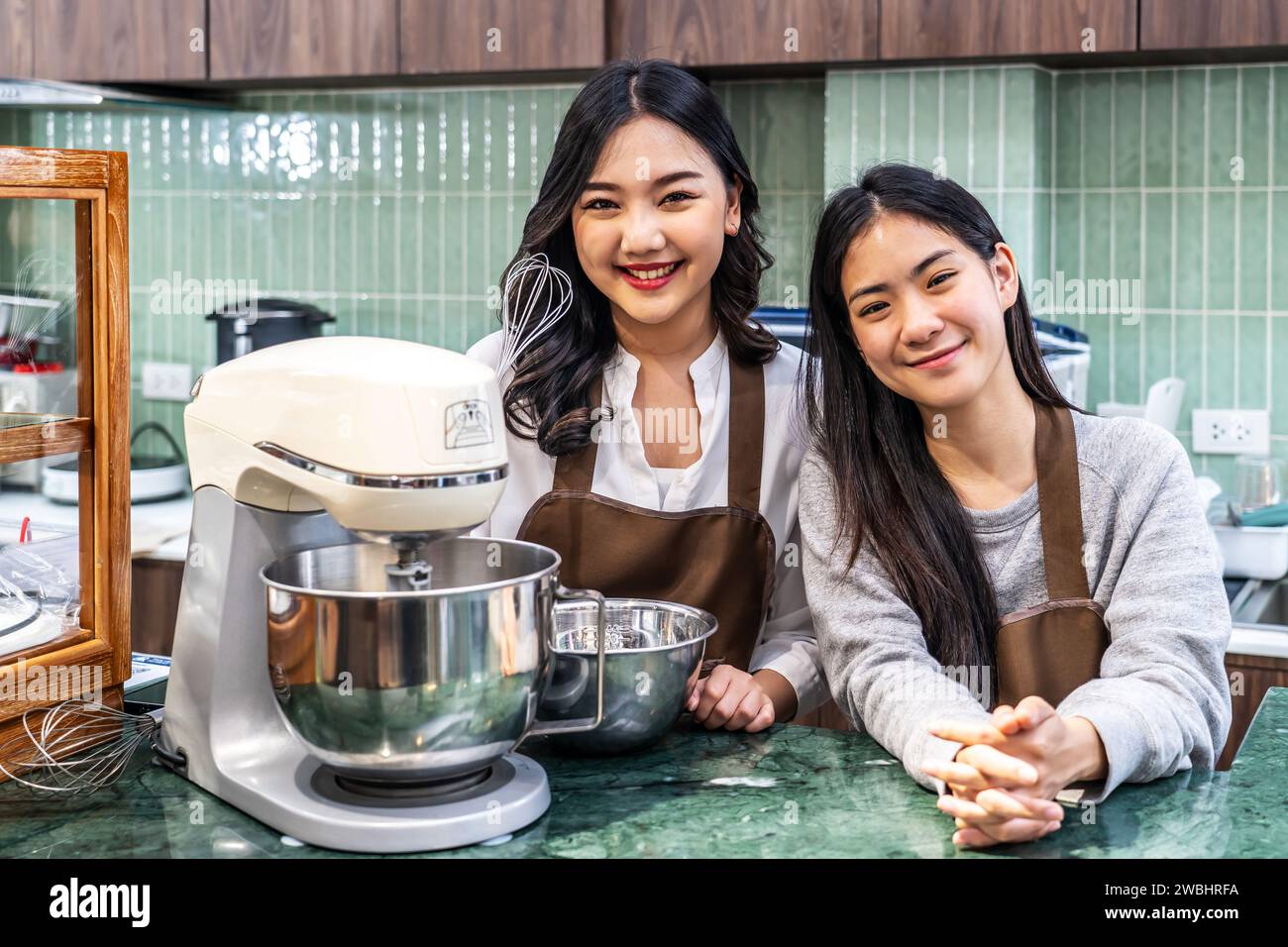Small startup business owner concept. two successful young asian ...
