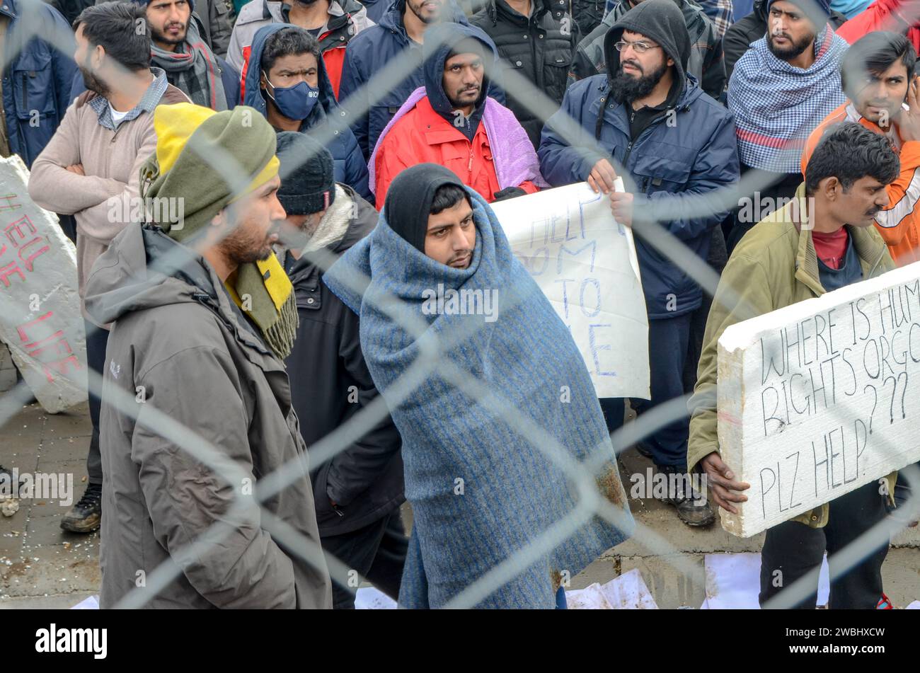 Refugees protest against poor living conditions at Camp Lipa. Group of ...