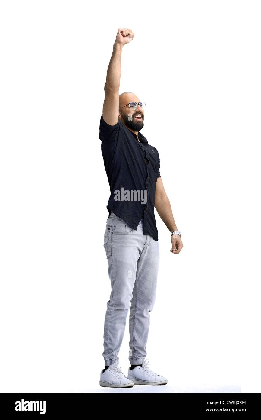 A man, on a white background, in full height, raised his hand Stock ...