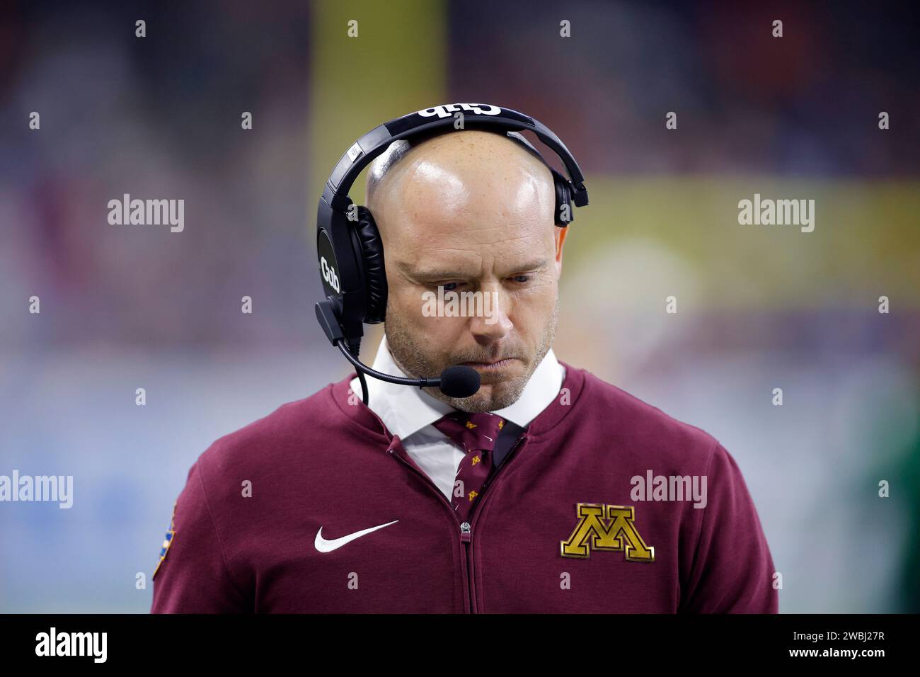 Minnesota coach P.J. Fleck walks the sideline during the Quick Lane ...