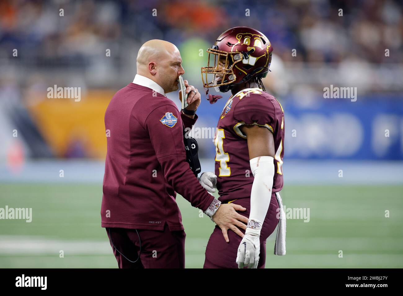 Minnesota coach P.J. Fleck, left, talks with defensive back Kerry Brown ...