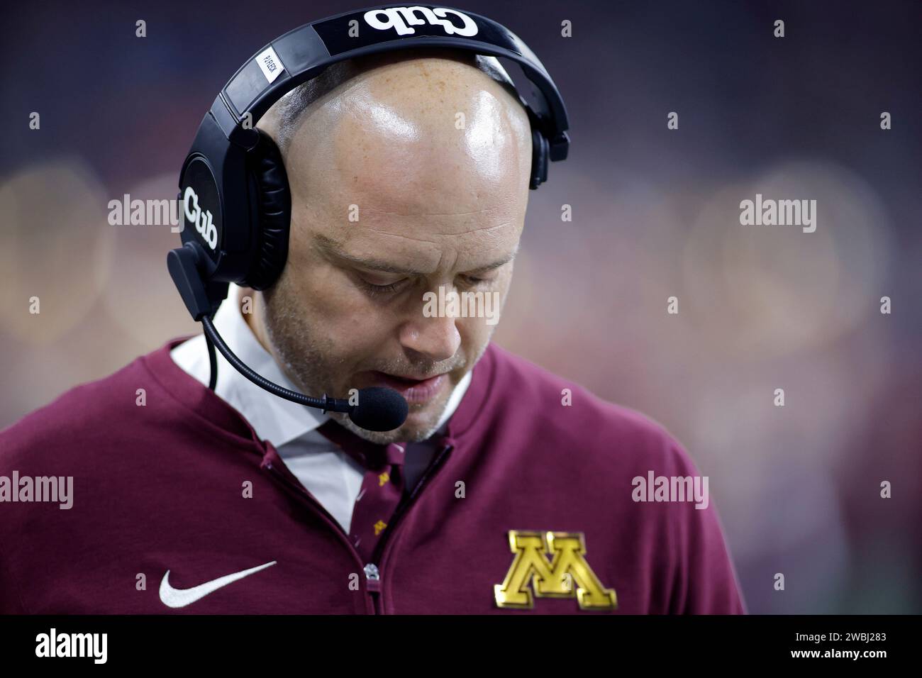 Minnesota coach P.J. Fleck walks the sideline during the Quick Lane ...