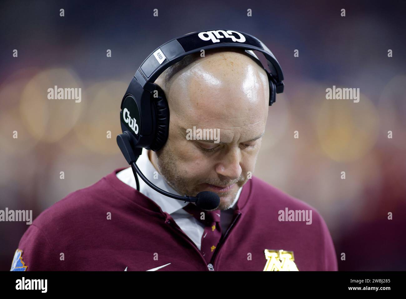 Minnesota coach P.J. Fleck walks the sideline during the Quick Lane ...