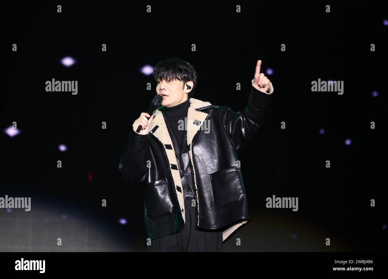 Chinese singer-songwriter, actor and producer Li Ronghao performs at a ...