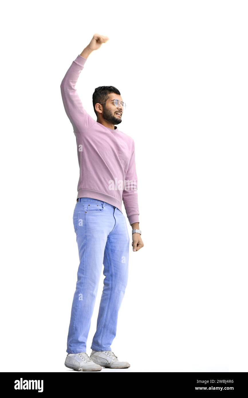 A man, on a white background, in full height, raised his hand Stock ...