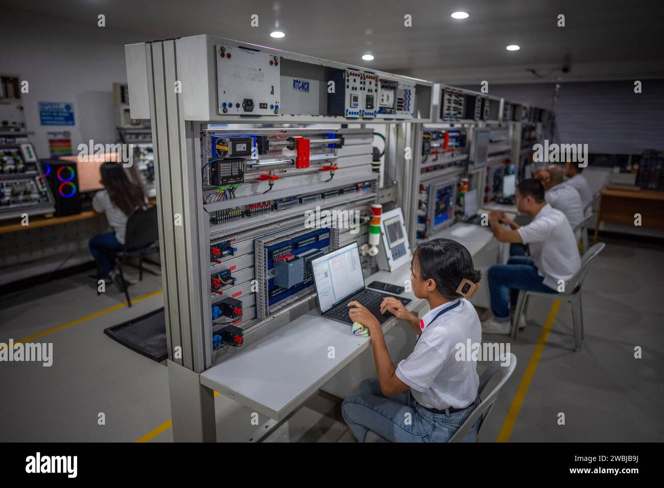 Manila, Philippines. 11th Jan, 2024. Trainees work in mechatronics ...
