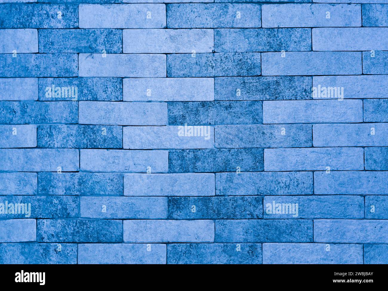The background is a blue brick wall. textured brick backdrop Stock ...