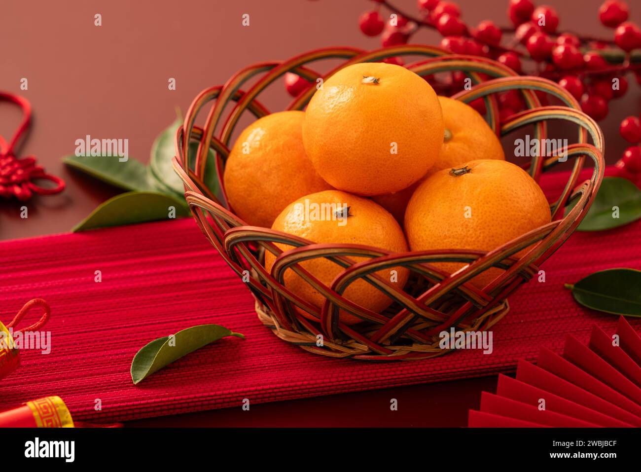 Chinese lunar new year background with fresh tangerine, red envelope ...