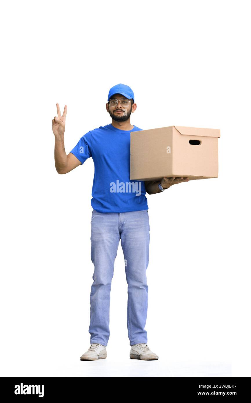 A male deliveryman, on a white background, in full height, with a box ...