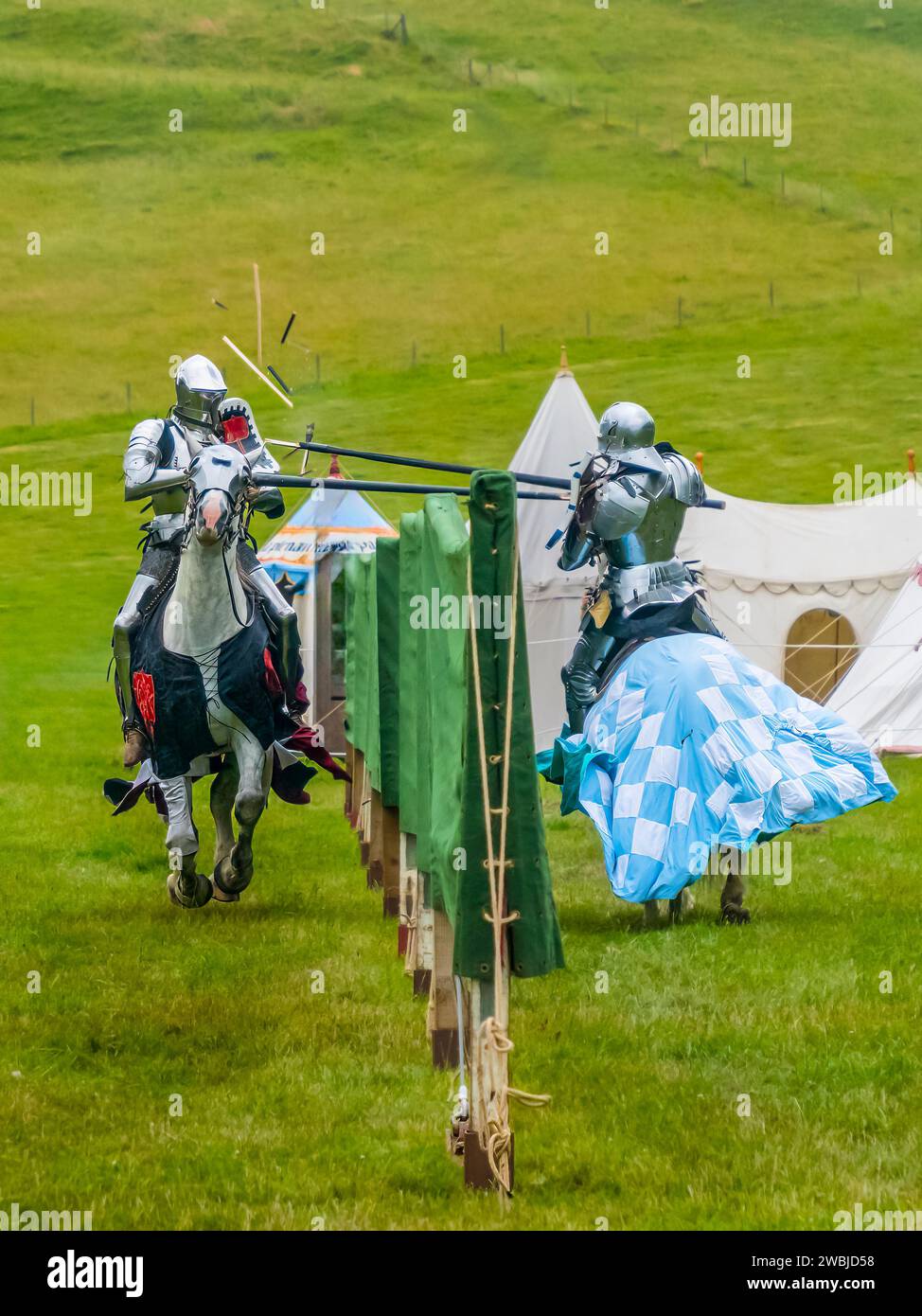 Medieval Knights in amour on horseback jousting at the Chalke Valley ...