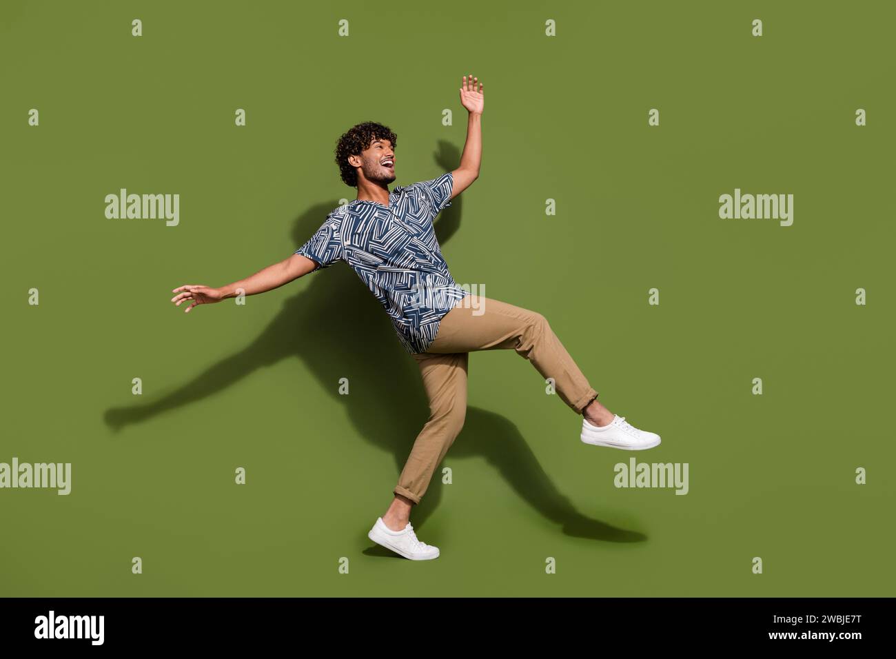 Full body length photo of young funky mexican guy steps silent to that ...
