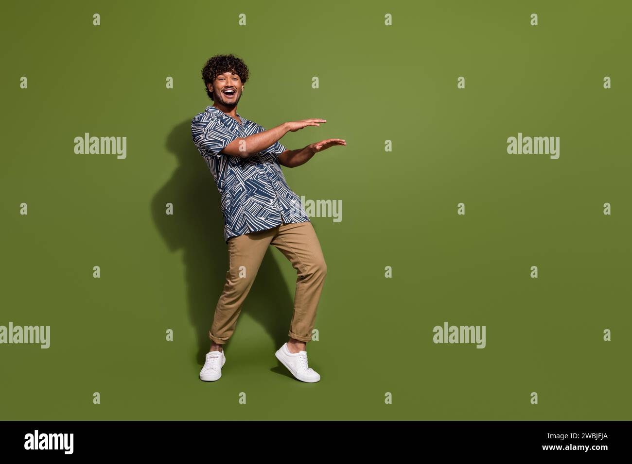 Full body photo of crazy hispanic guy wearing trendy apparel doing ...