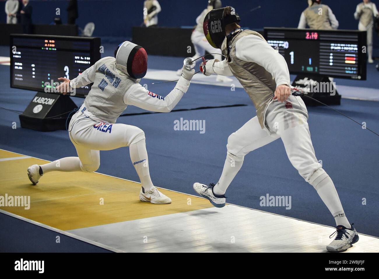 Paris, France. 11th Jan, 2024. South Korea's foilist DONGSU KIM (L ...