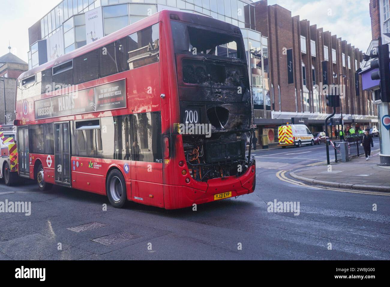 London, UK. 11 January 2024. . An electric bus is towed away after it ...