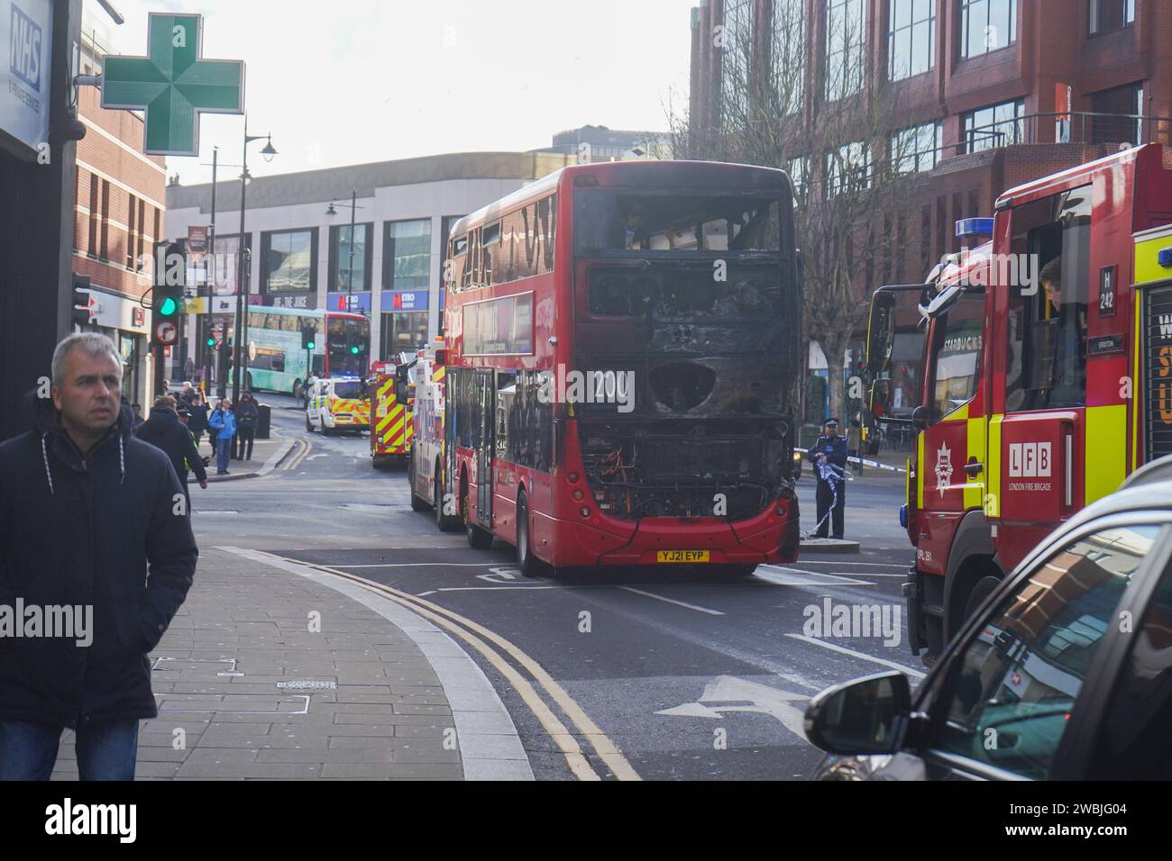 London, UK. 11 January 2024. . An electric bus is towed away after it ...
