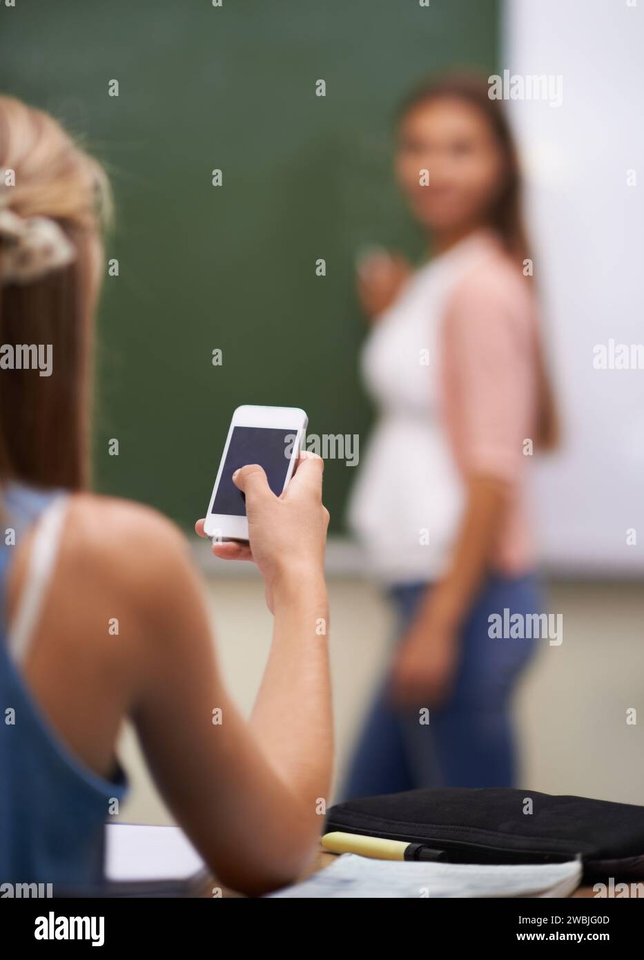 Smartphone, student and texting in classroom, social media and ...