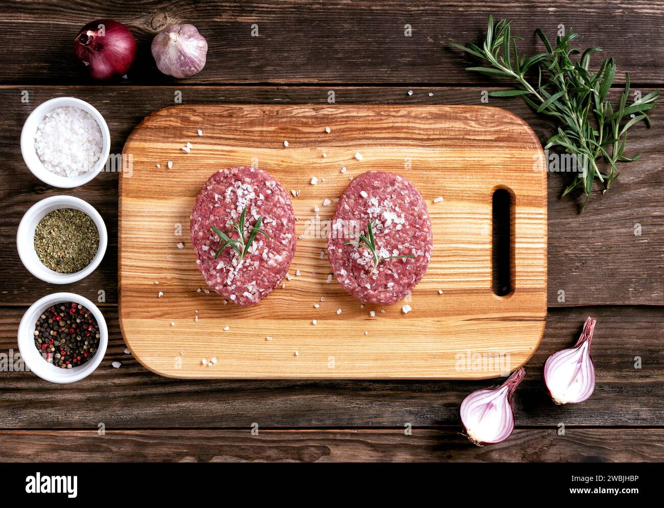 Raw meat round cutlets - for cooking homemade hamburgers. Cutlets on a ...