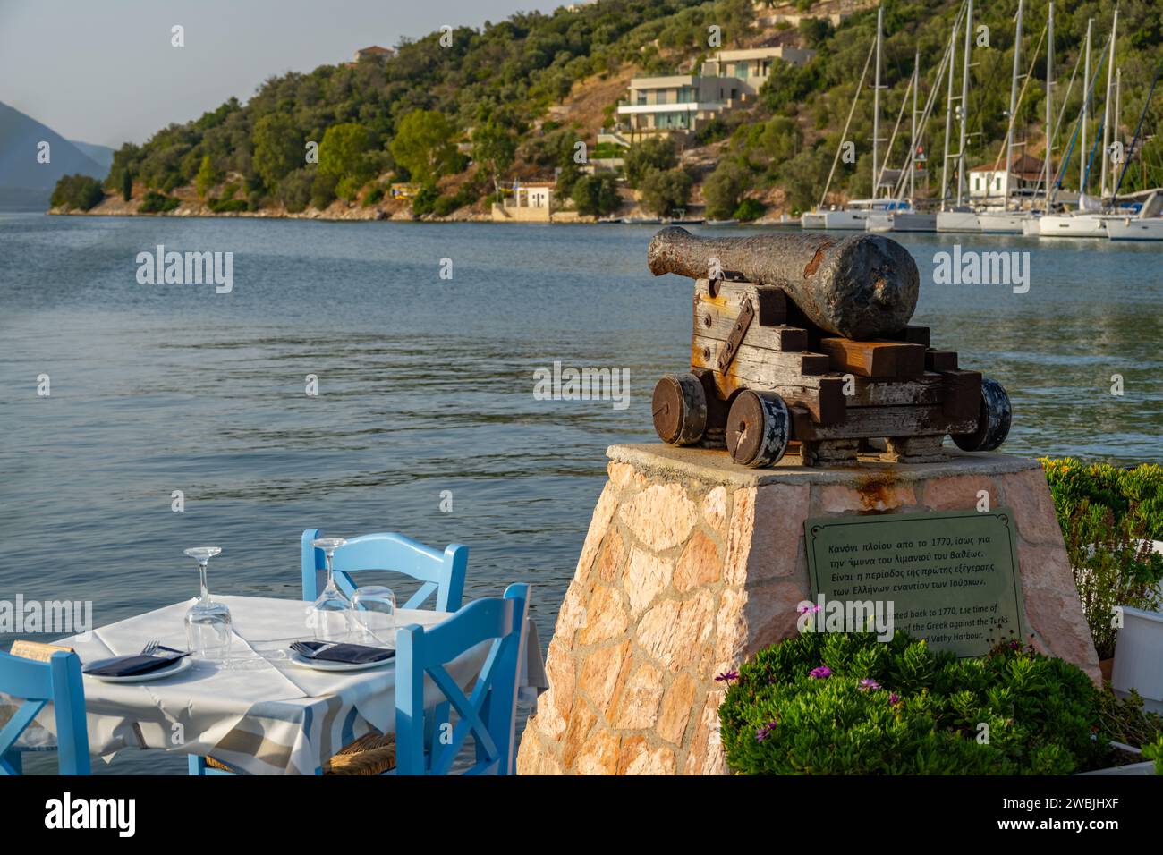 Salvaged cannon in the harbour of Vathi on the island of Meganisi in ...