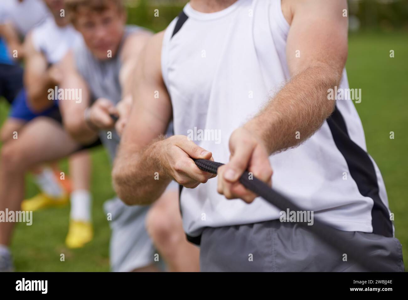 Rope, arm pull and men hands with teamwork, tug of war and fitness ...