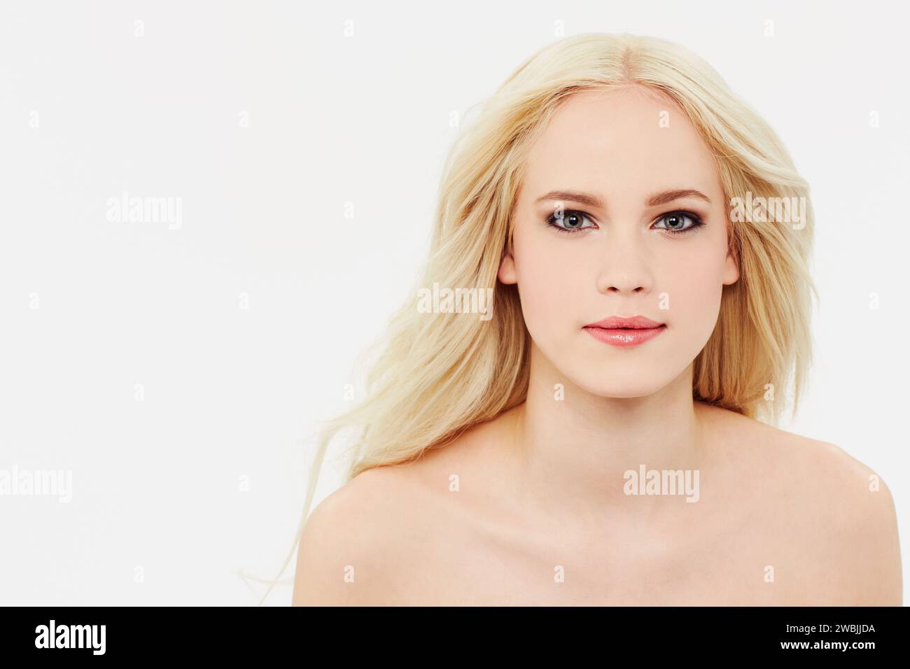 Cosmetic, beauty and portrait of woman with makeup in white background ...