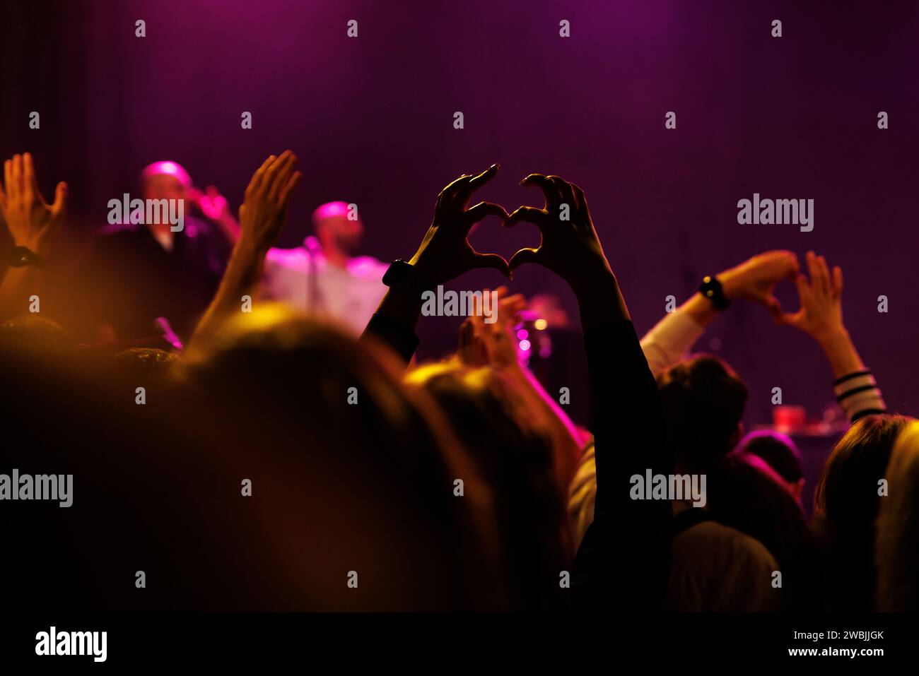 The people are making heart shapes with their hands Stock Photo - Alamy