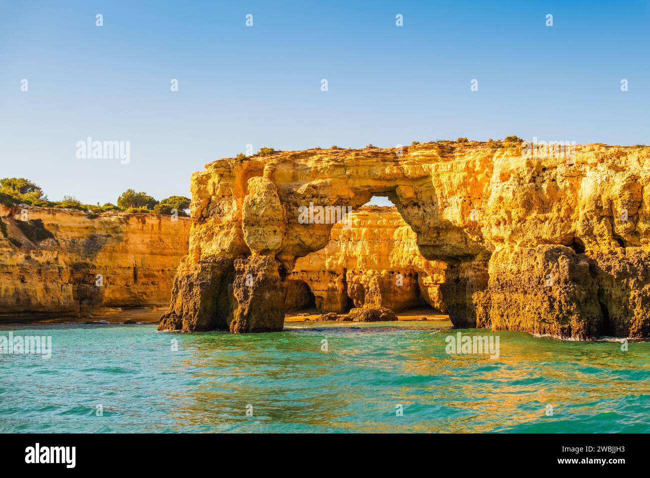Beautiful limestone Algarve coast with caves and rock formation ...