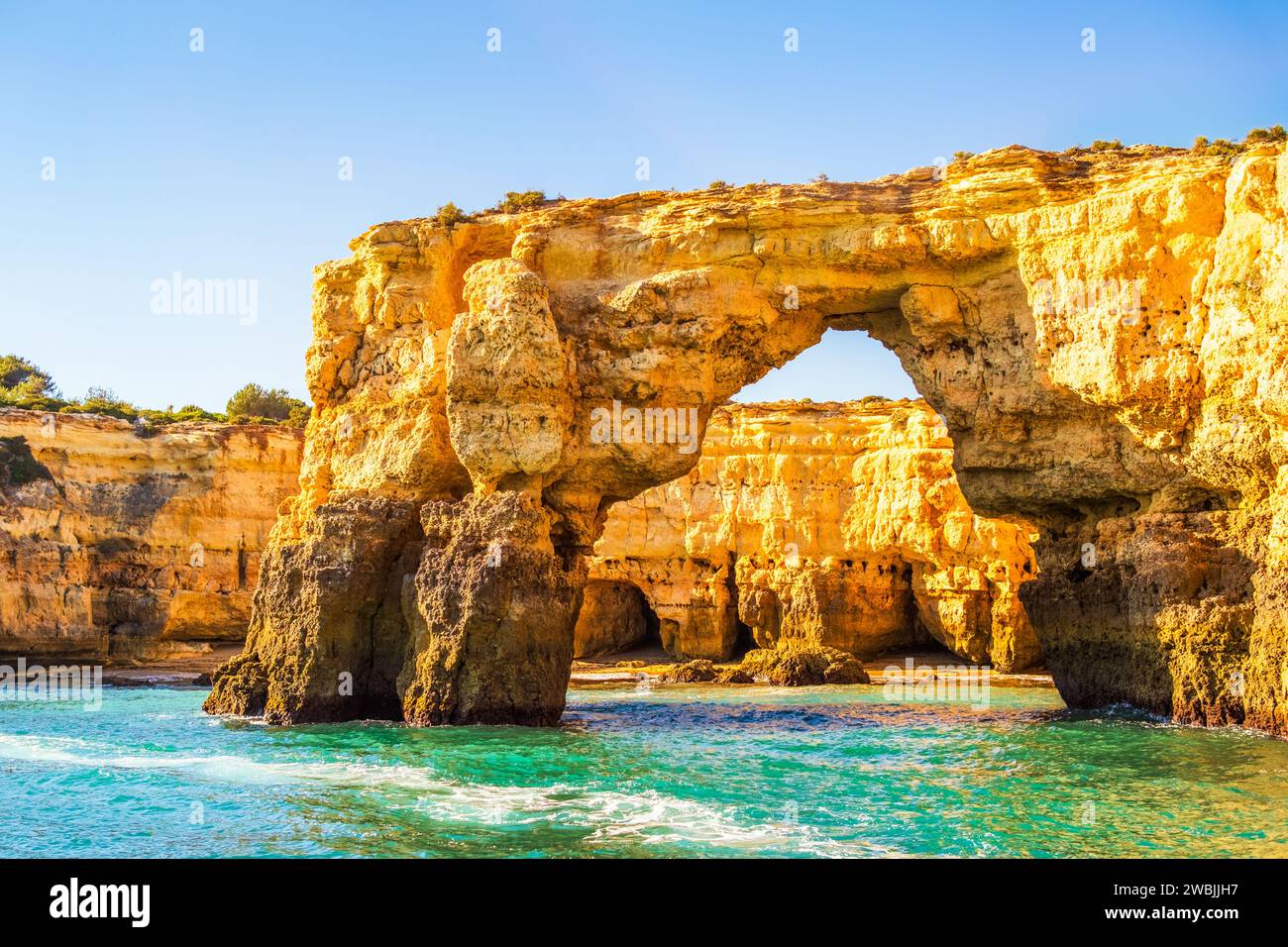 Beautiful limestone Algarve coast with caves and rock formation, Albufeira, south of Portugal ...