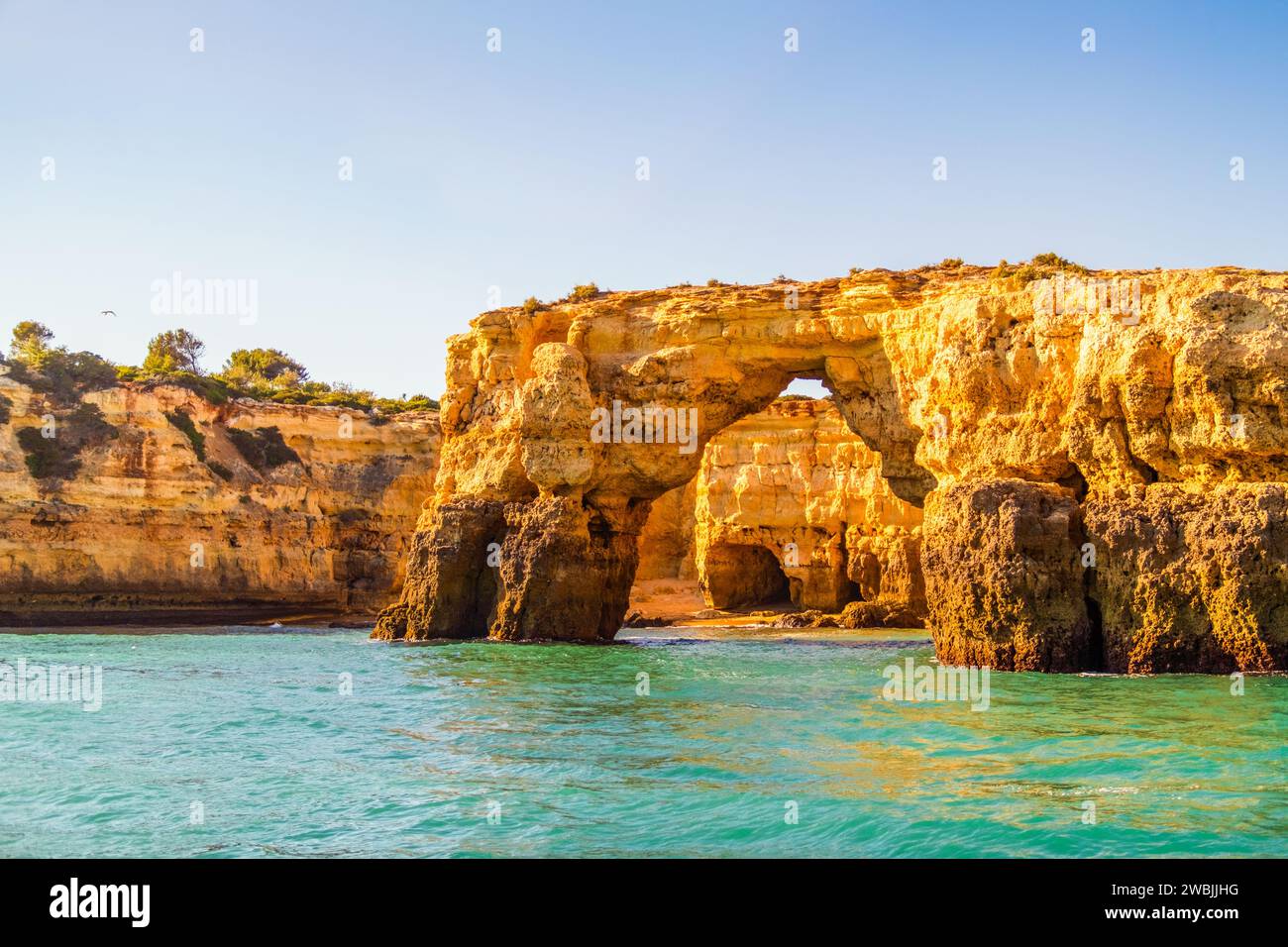 Beautiful limestone Algarve coast with caves and rock formation, Albufeira, south of Portugal ...
