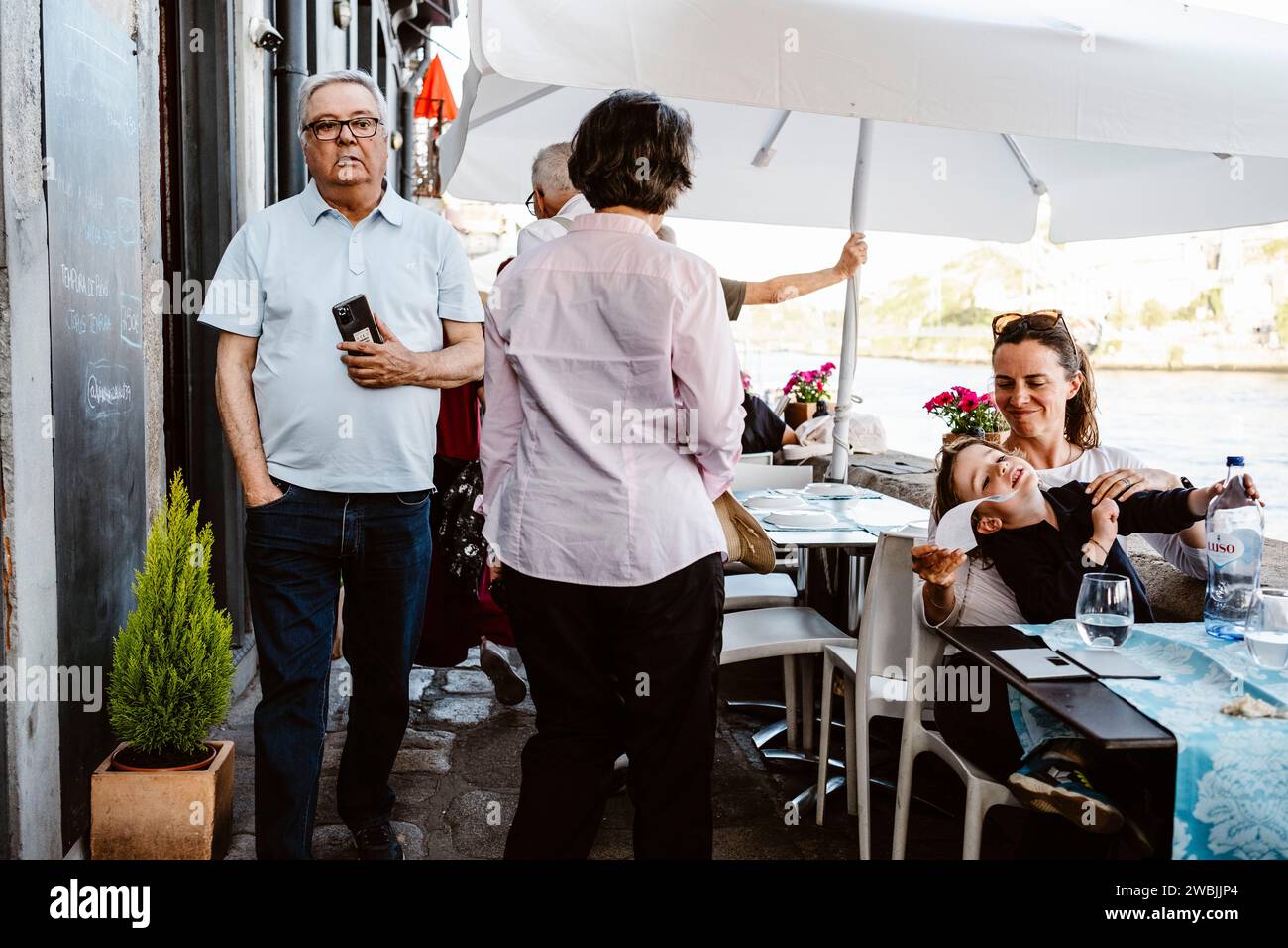 April 17, 2023 - Porto, Portugal: People, tourists relaxing, enjoying ...