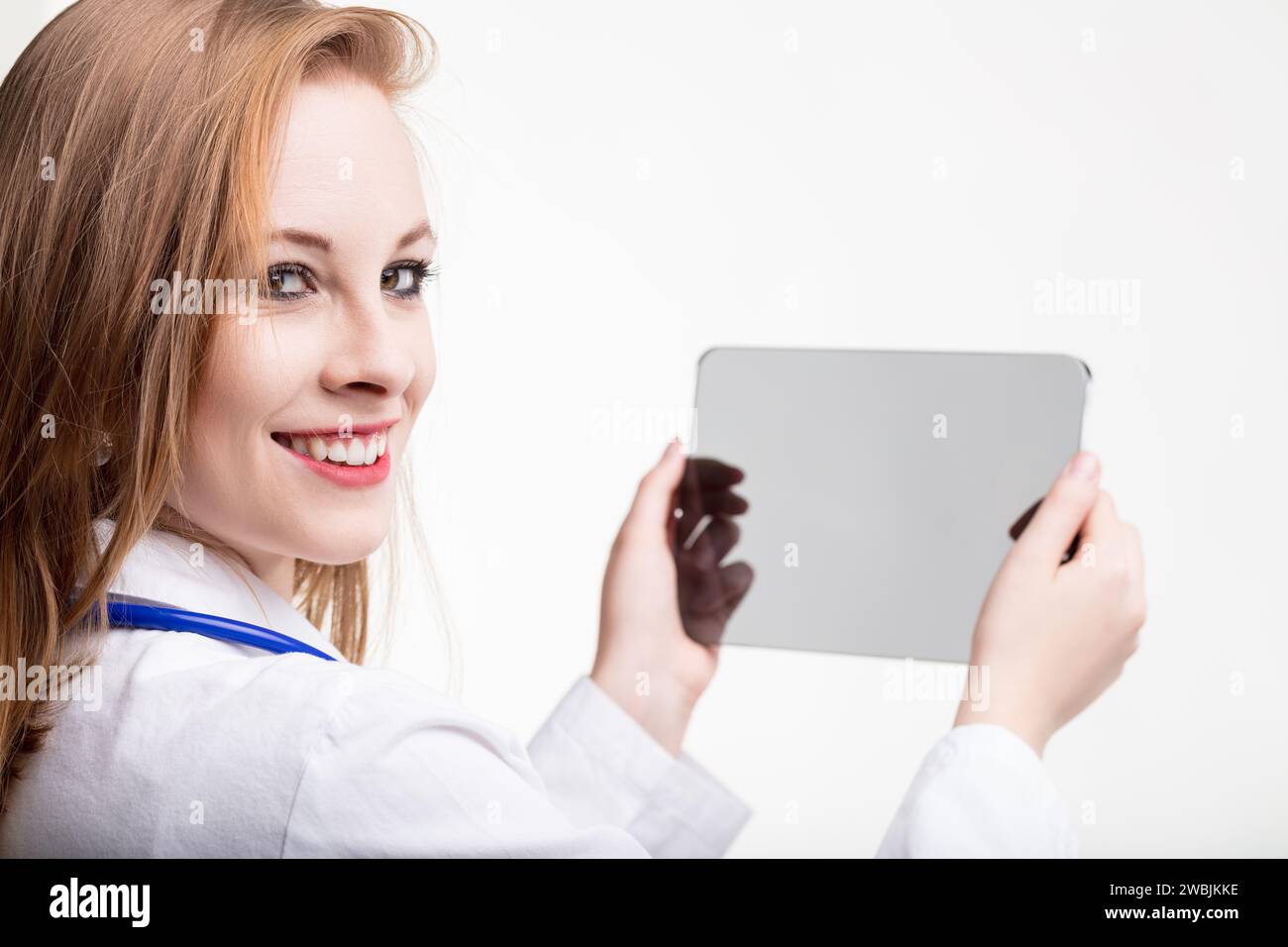 Healthcare meets advanced technology as a cheerful medic showcases a ...