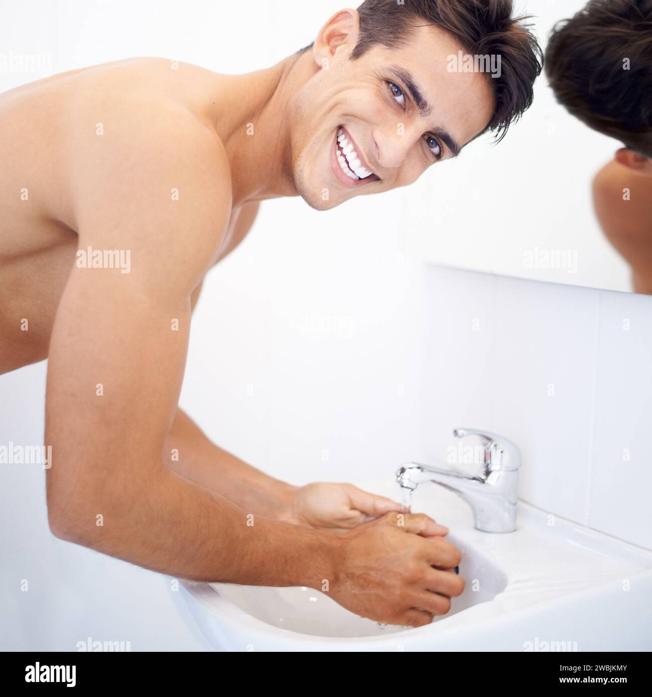 Man washing face in basin hi-res stock photography and images - Alamy