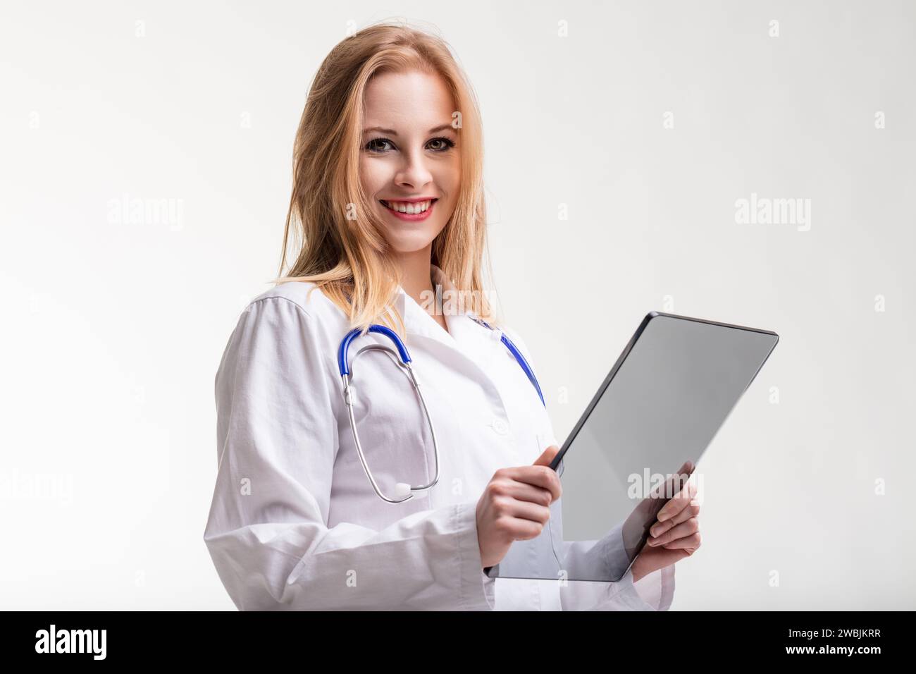 The medic's cheerful demeanor and transparent tablet represent the ...
